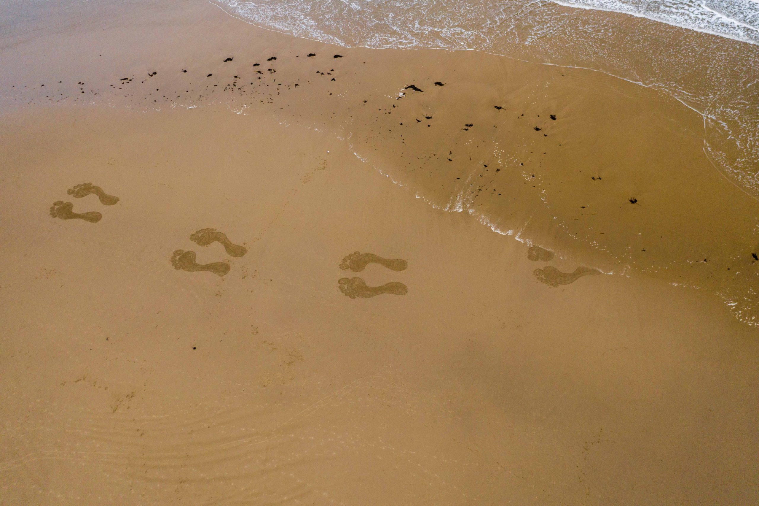 Sand Drawing to raise awareness of cancer crisis for Macmillan Cancer ...