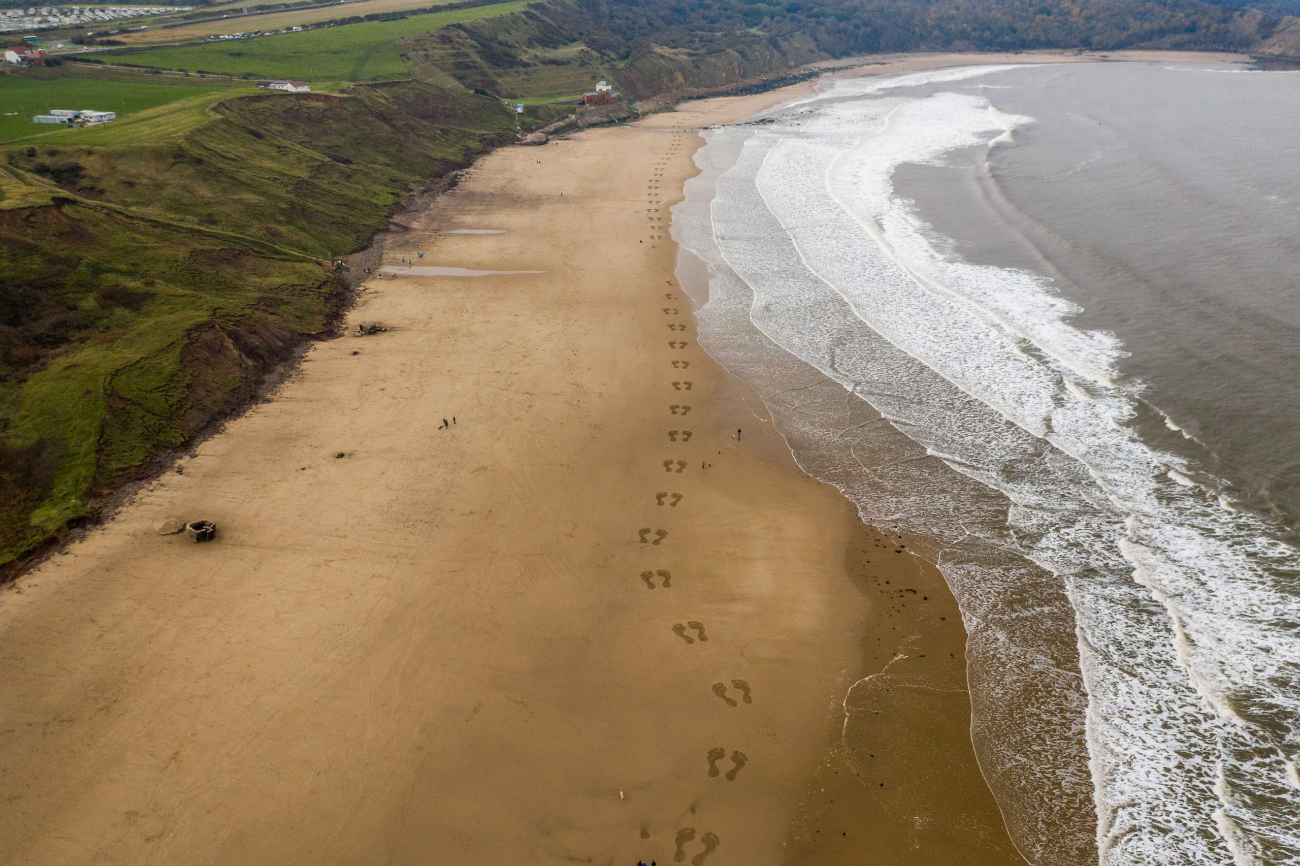 Sand Drawing to raise awareness of cancer crisis for Macmillan Cancer ...